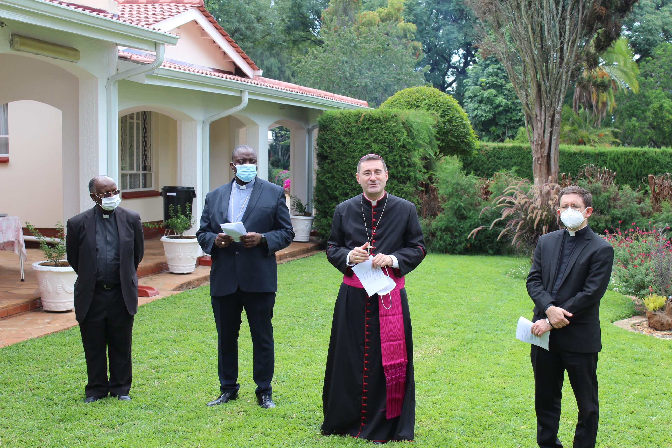 the-papal-nuncio-to-zimbabwe-archbishop-paolo-redelli-flanked-by-fr ...