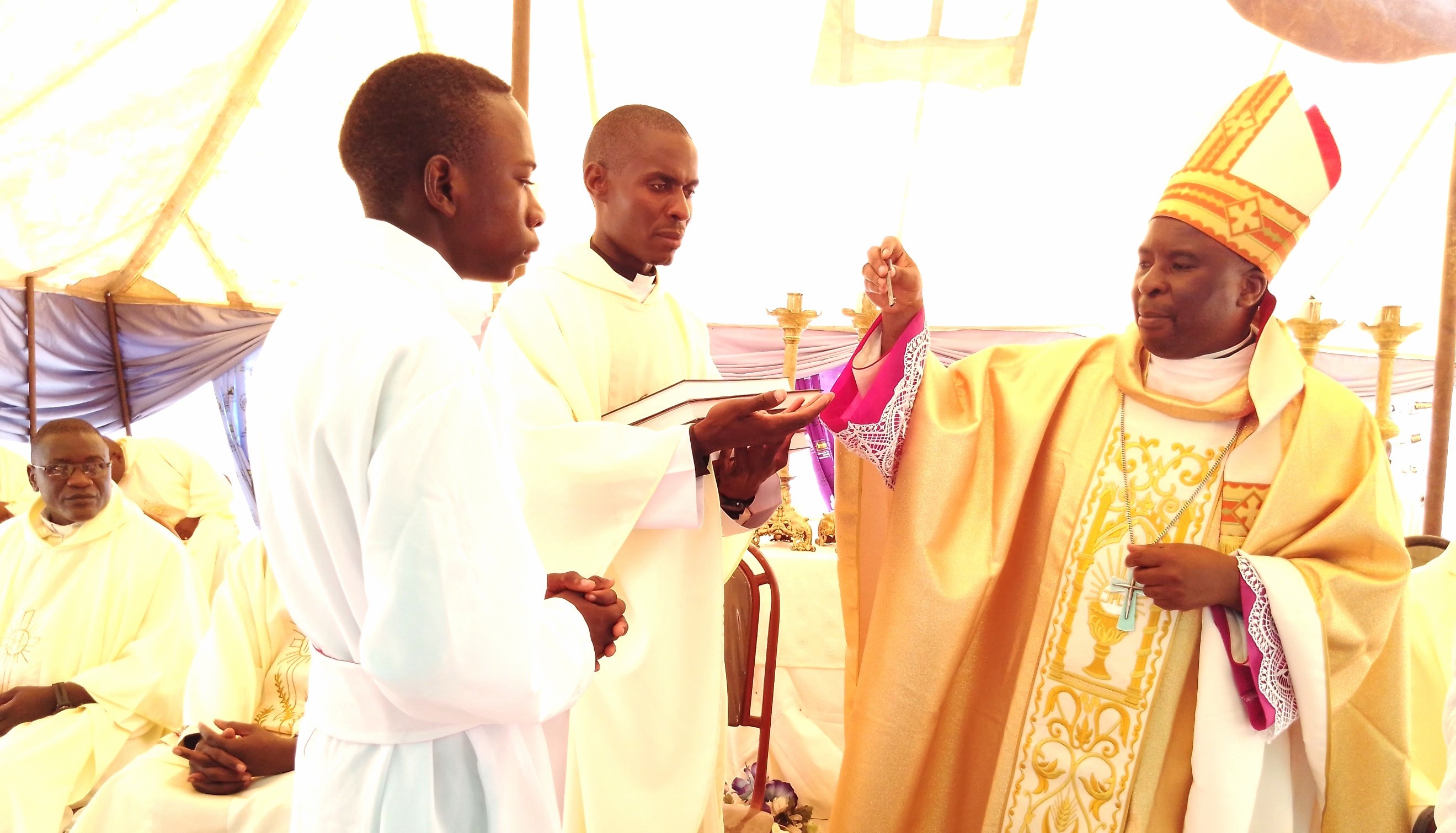 Bishop-Ncube-hands-over-keys-to-acting-Parish-Priest-of-St.-Padre-Pio ...