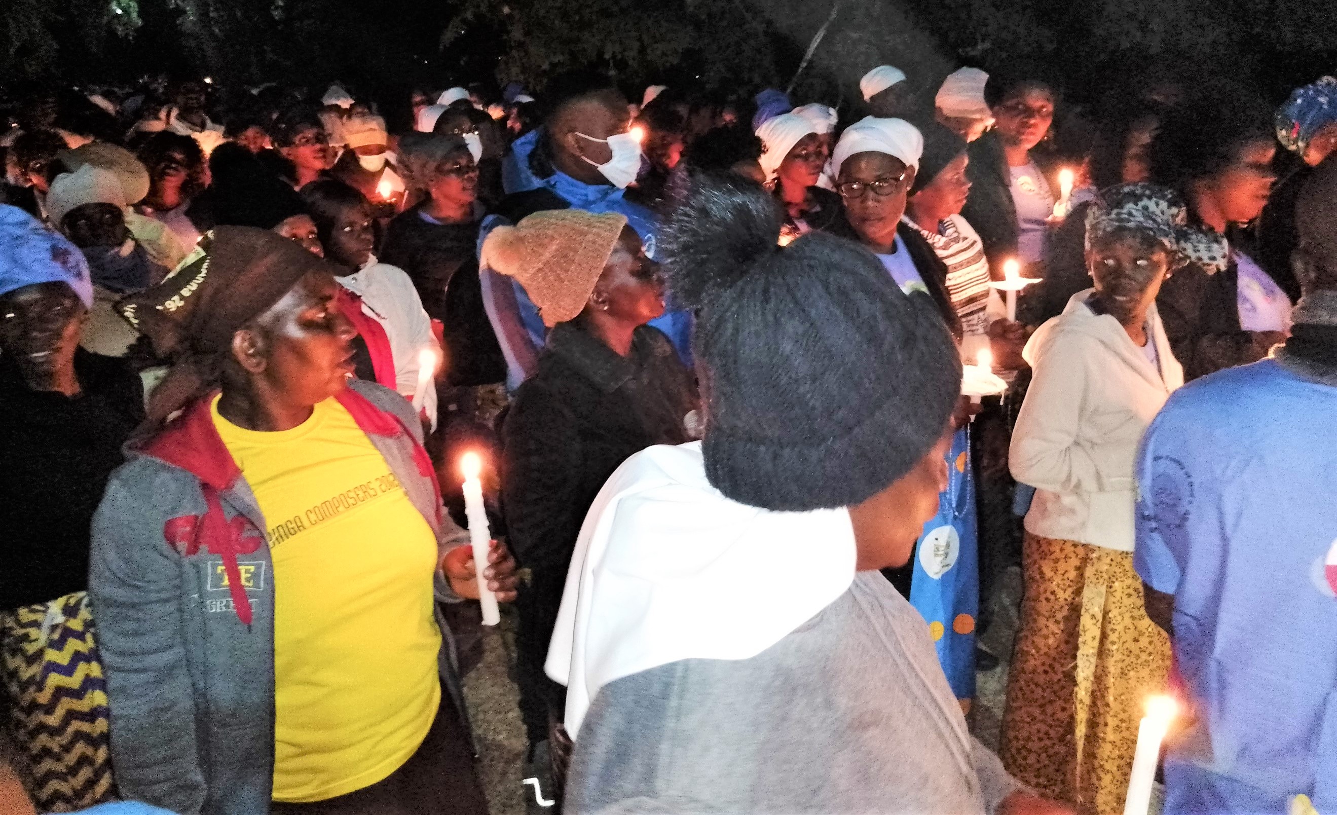 Pilgrims-light-candles-during-the-rosary-procession-around-the-Marian ...